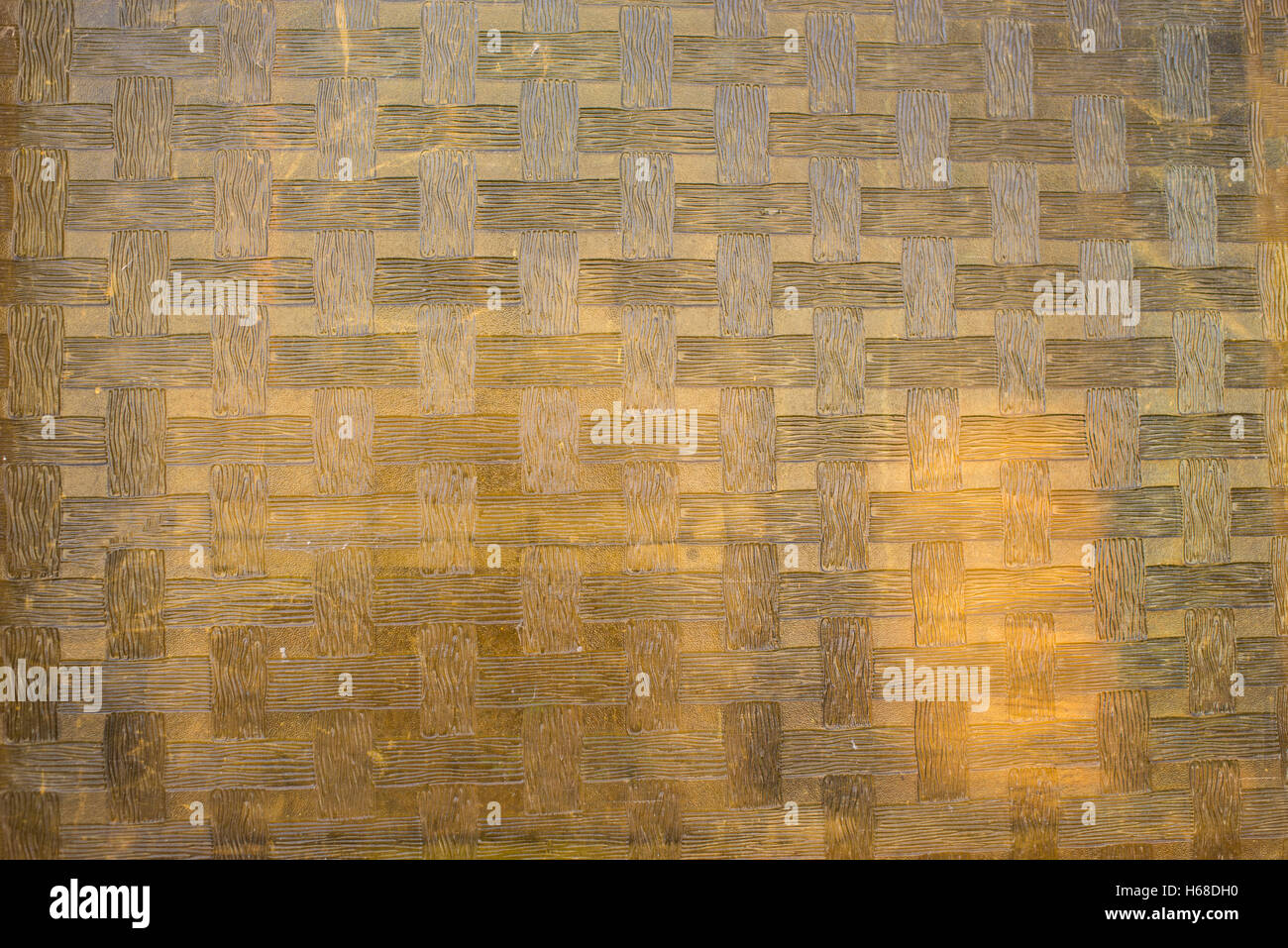 Yellow pattern glass window as a background Stock Photo - Alamy