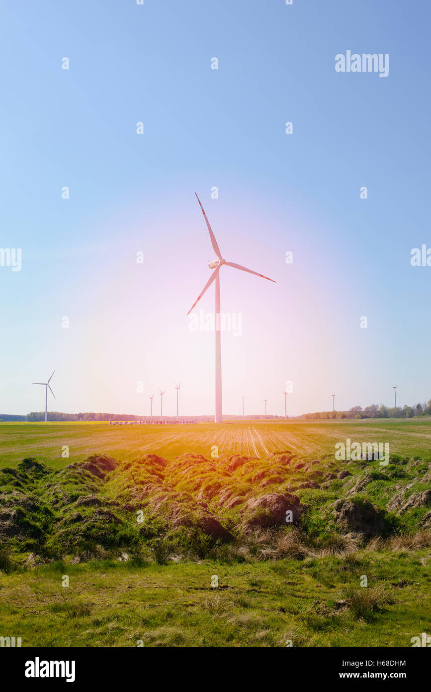 Bright blue sky moving and wind turbine Stock Photo - Alamy