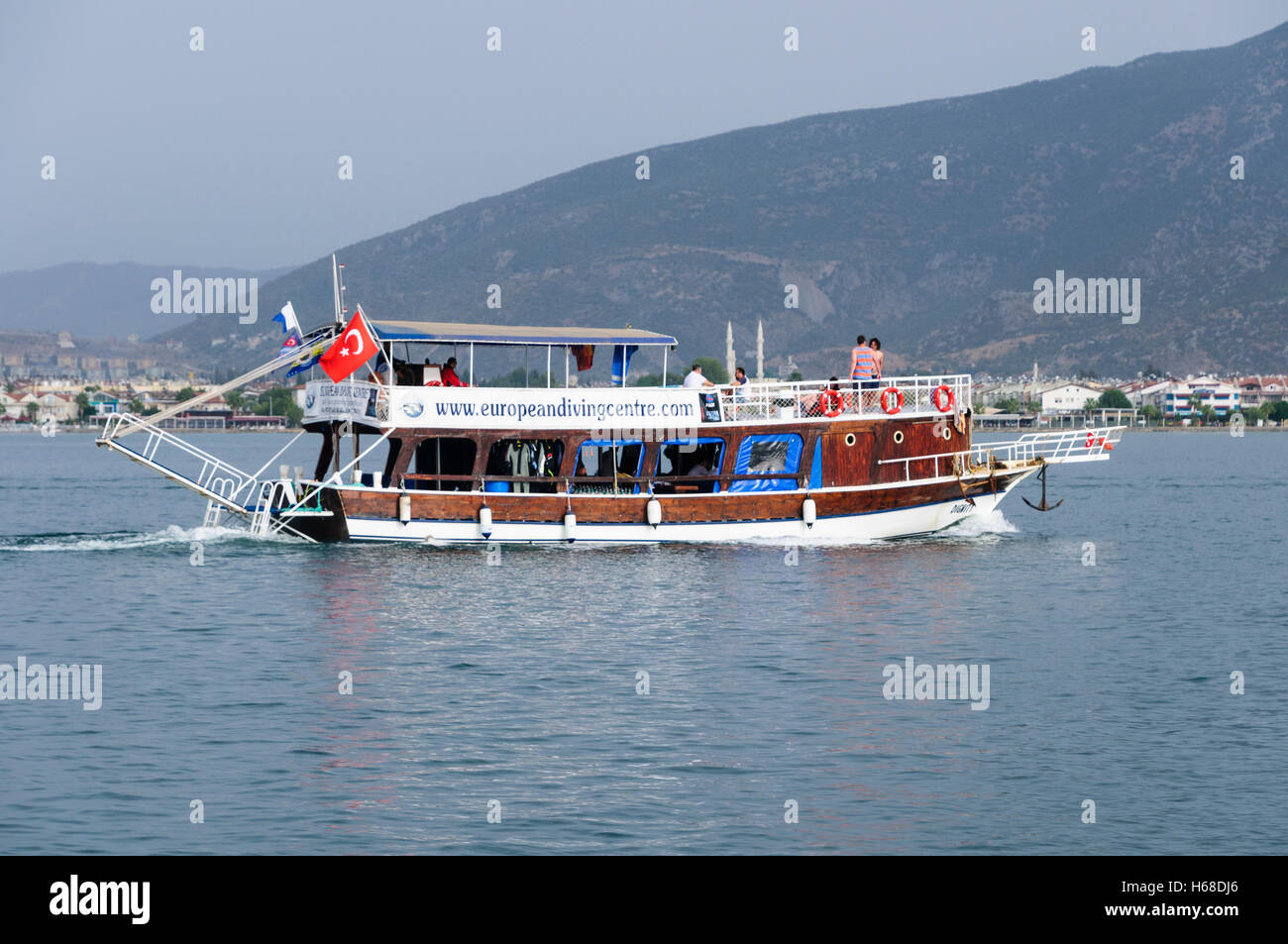 A wooden dive boat under motor power on the sea off Turkey Stock Photo ...