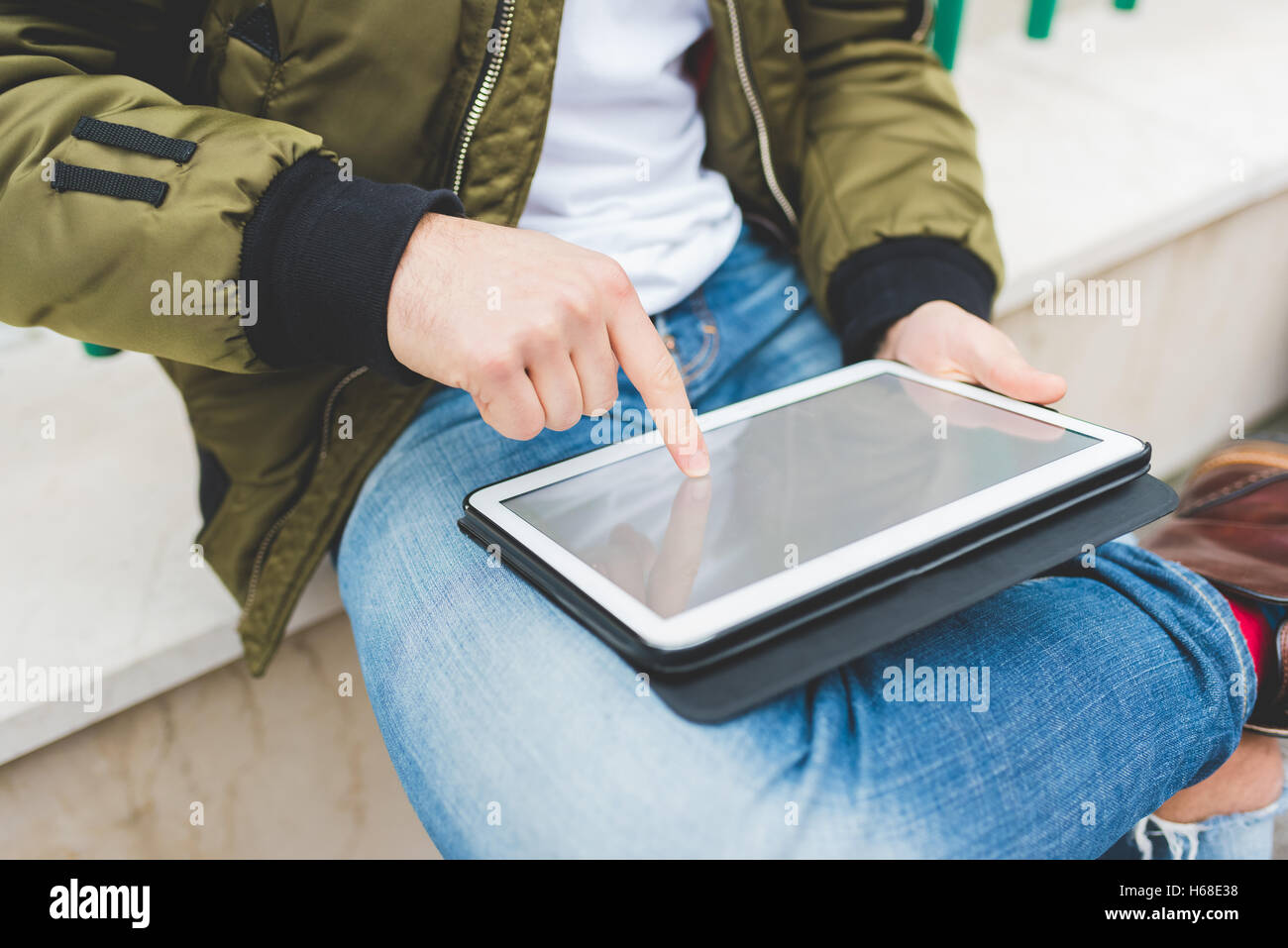 Checking email on touchscreen tablet hi-res stock photography and ...