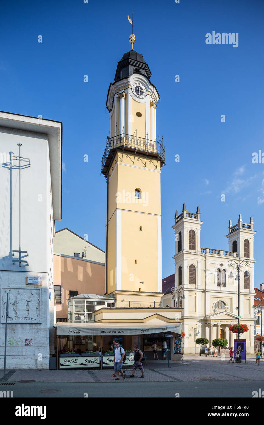 Banska Bystrica, Slovakia - august 07, 2015: Clock tower with St ...