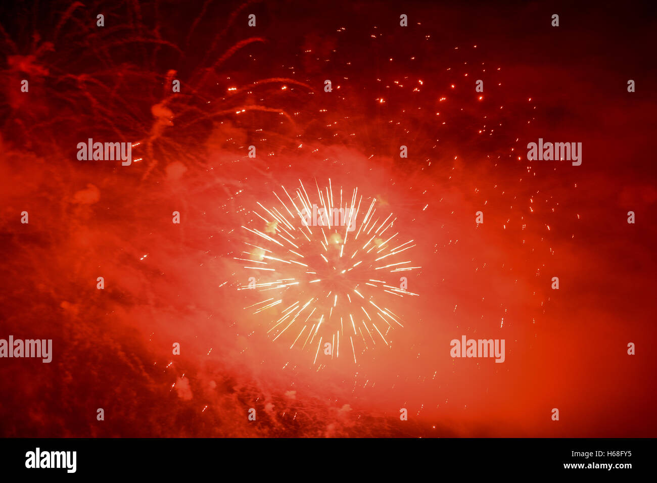 Festive colour firework background at a dark night Stock Photo - Alamy