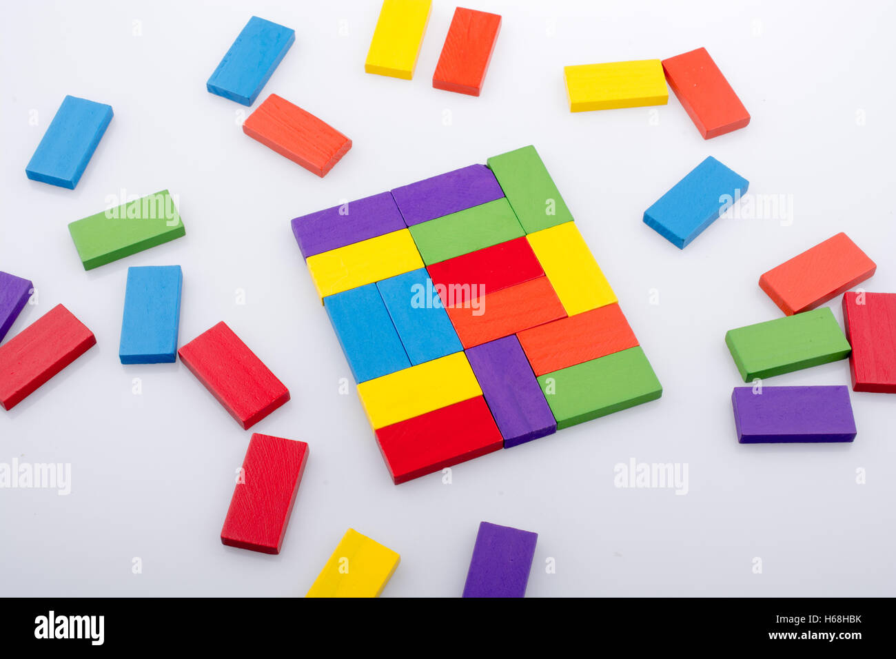Colorful Domino Blocks on a white background Stock Photo - Alamy