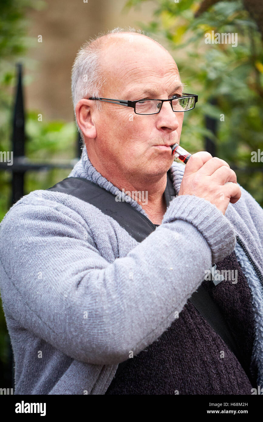 A man vaping Stock Photo - Alamy