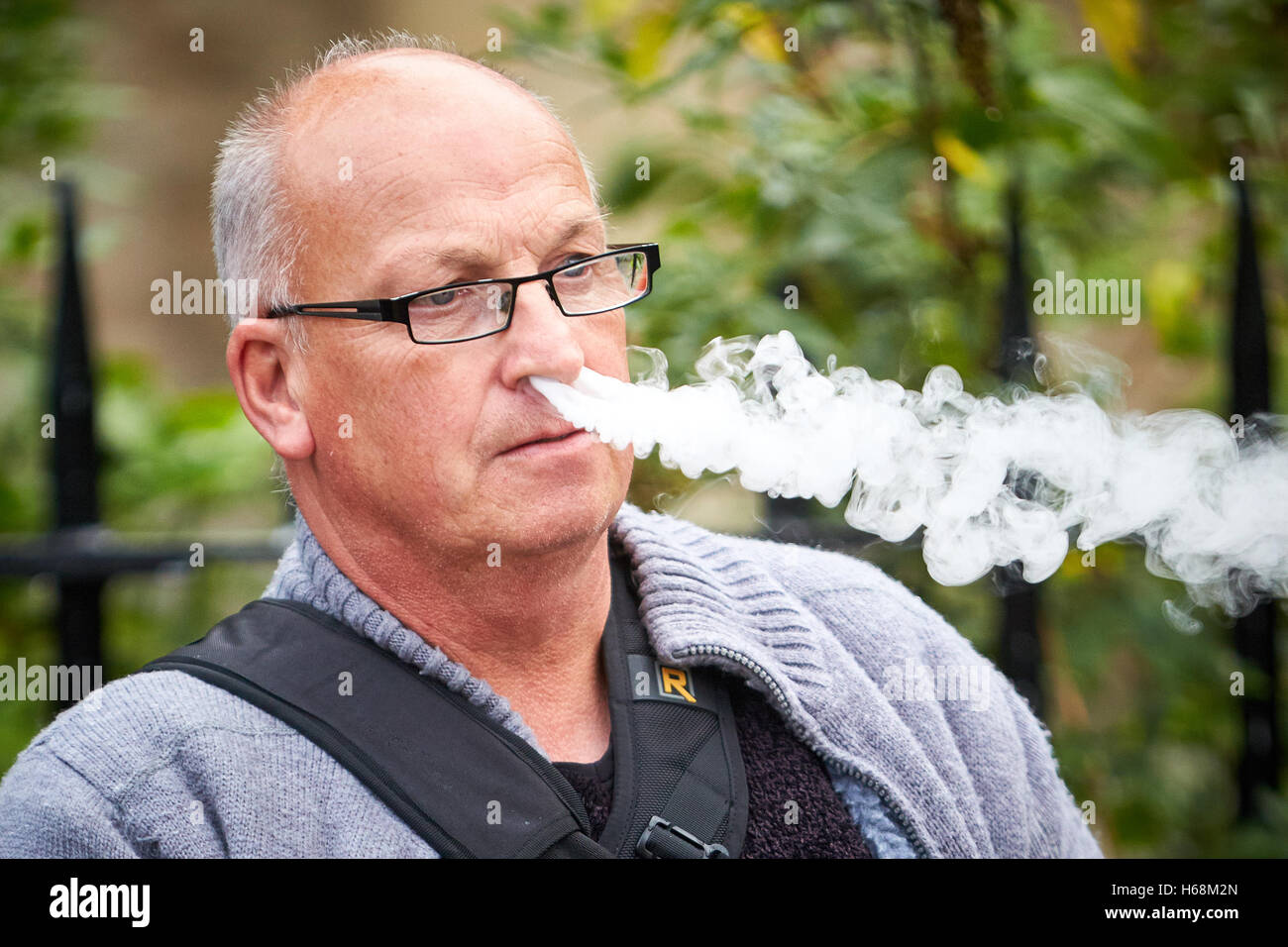 A man vaping Stock Photo - Alamy