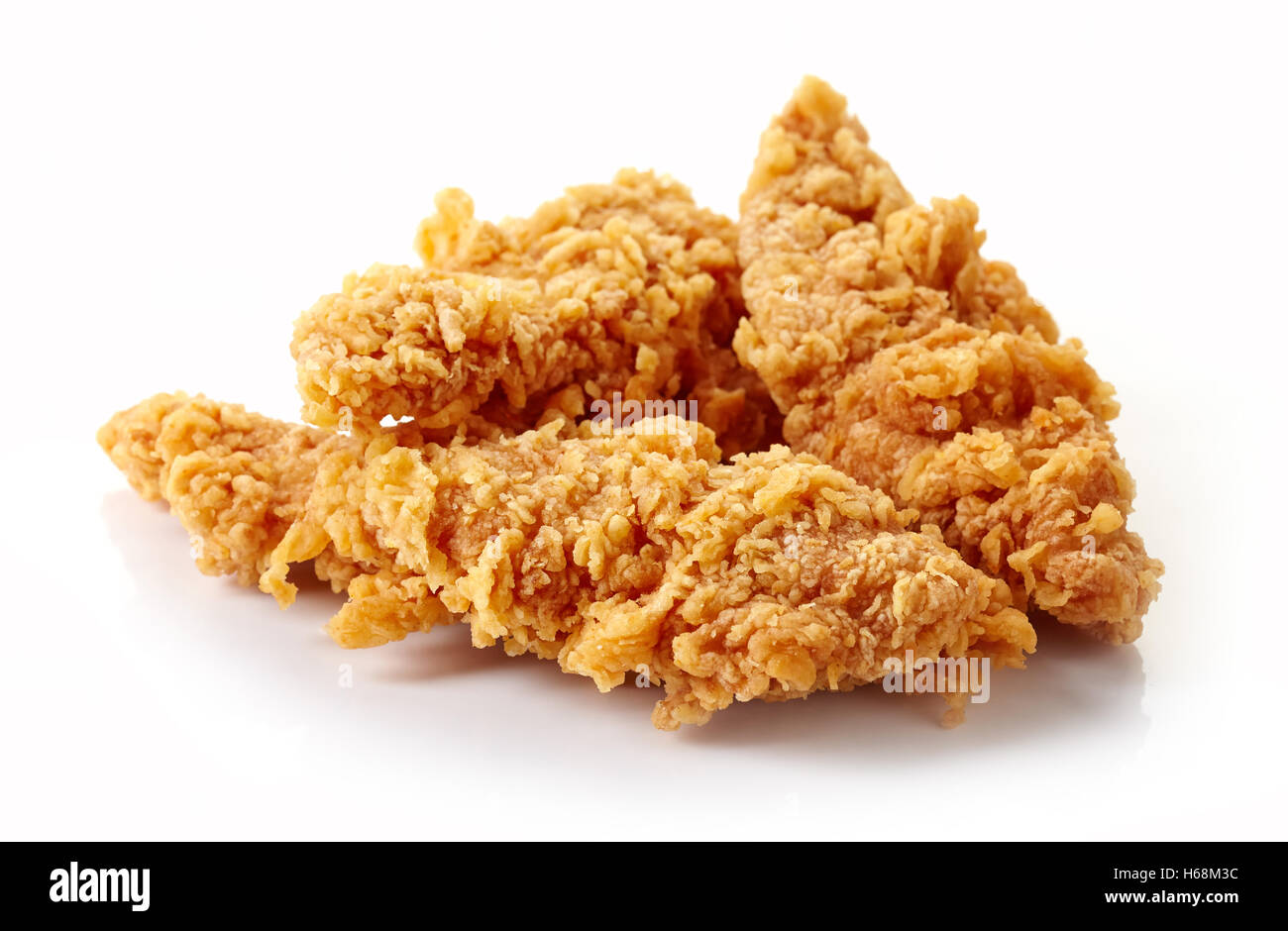 Fried breaded chicken fillet isolated on white background Stock Photo ...