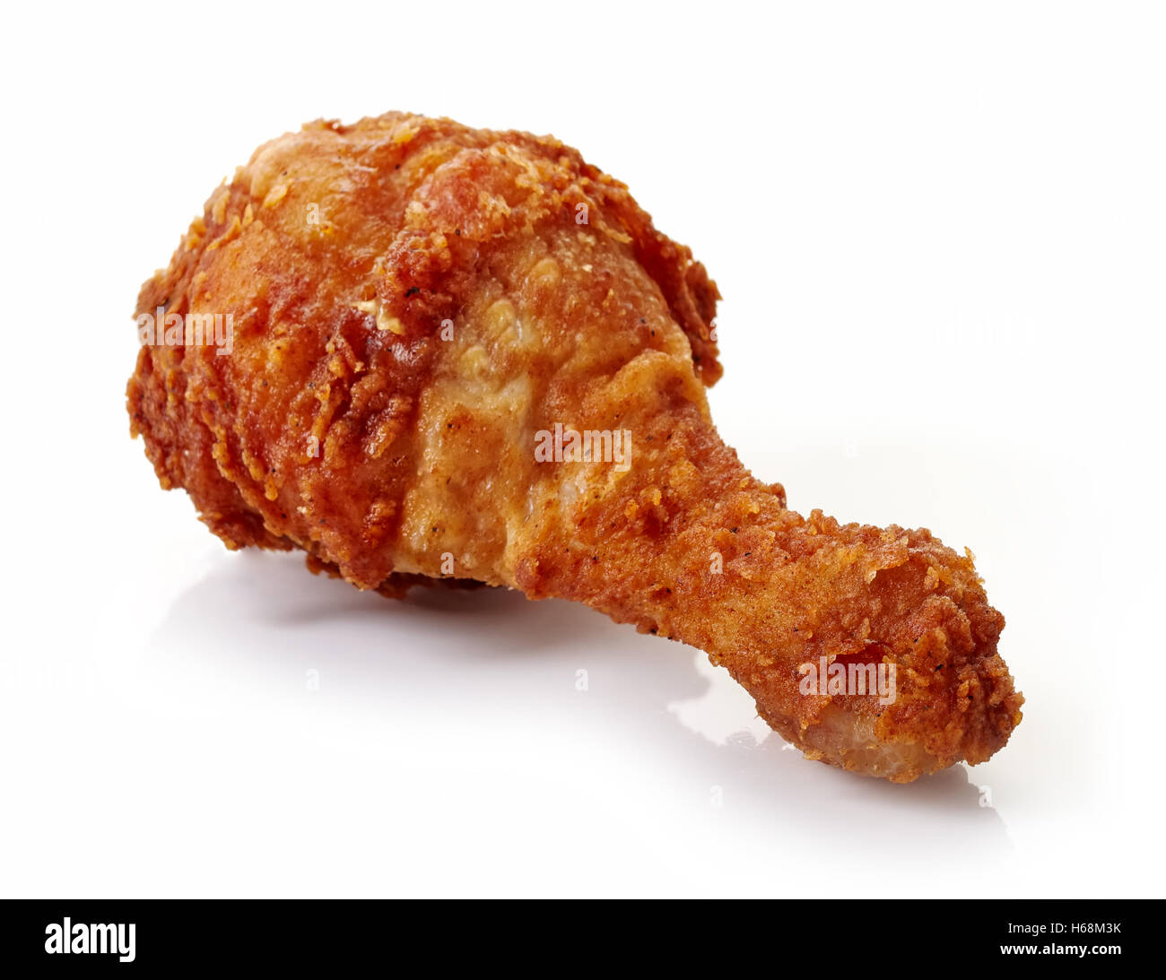 Fried breaded chicken leg isolated on white background Stock Photo - Alamy