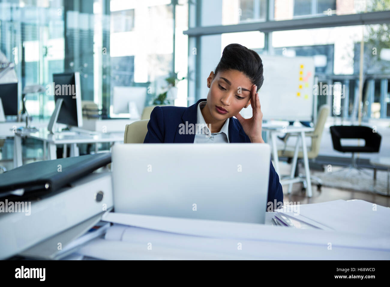 Stressed woman at desk hi-res stock photography and images - Alamy