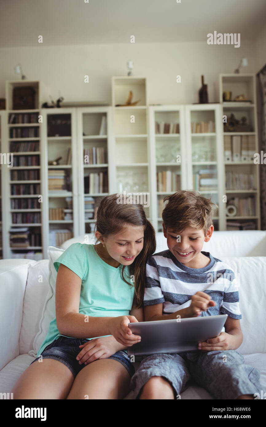 Children using digital tablet Stock Photo - Alamy