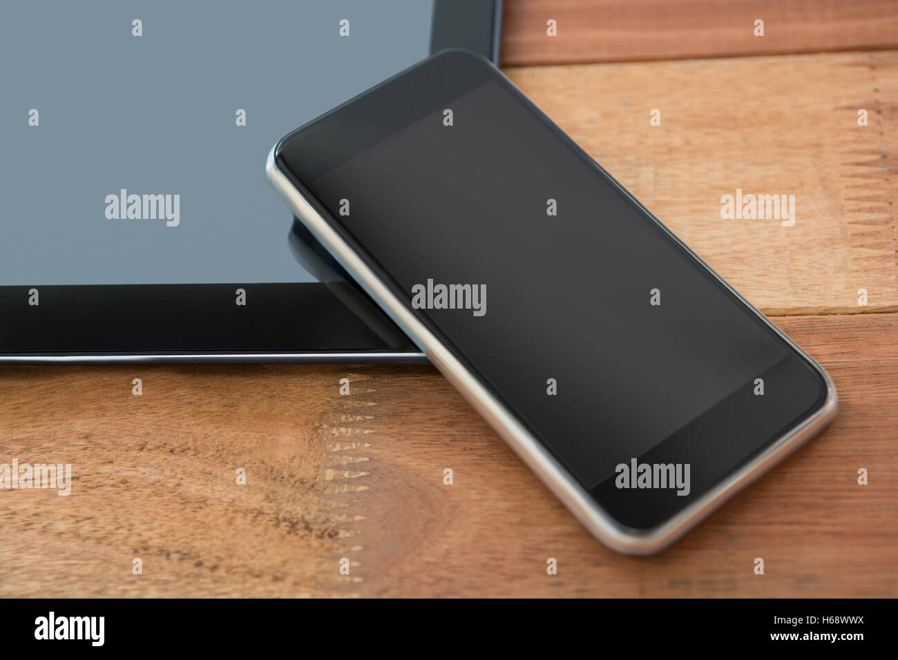 Digital tablet and mobile phone Stock Photo - Alamy