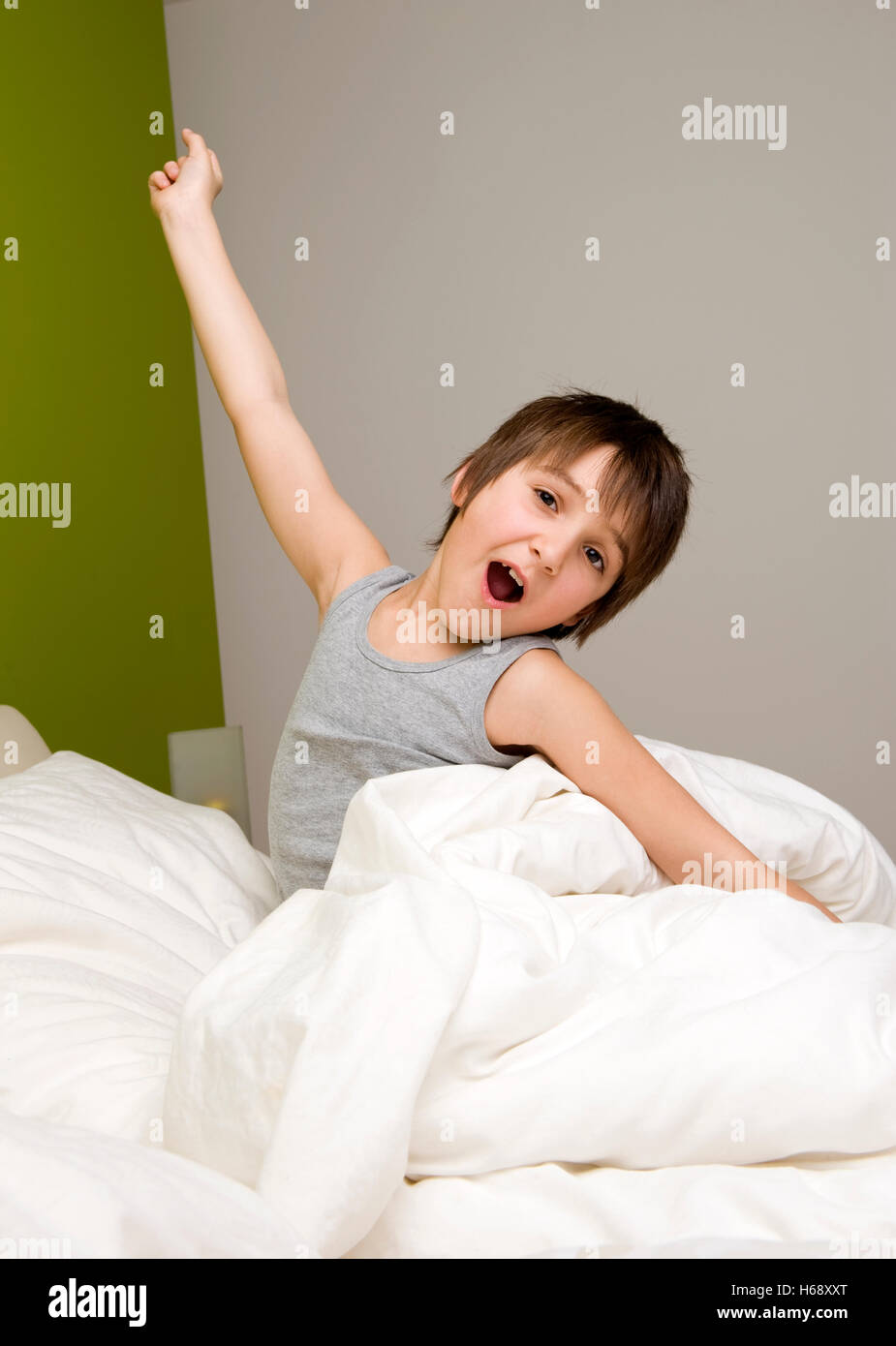 Little boy waking up in the morning Stock Photo - Alamy