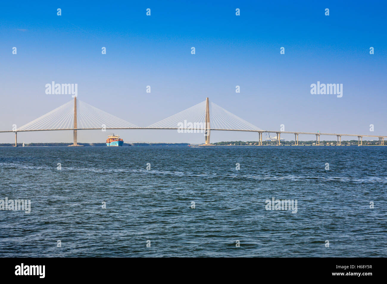 Freighter ships passing under the Arthur Ravenel jr.bridge on the ...