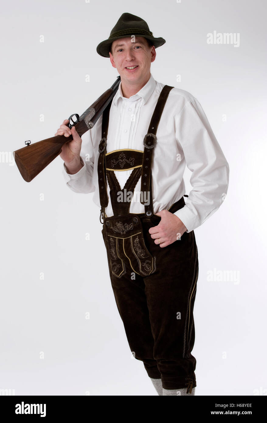 Hunter with gun Stock Photo - Alamy