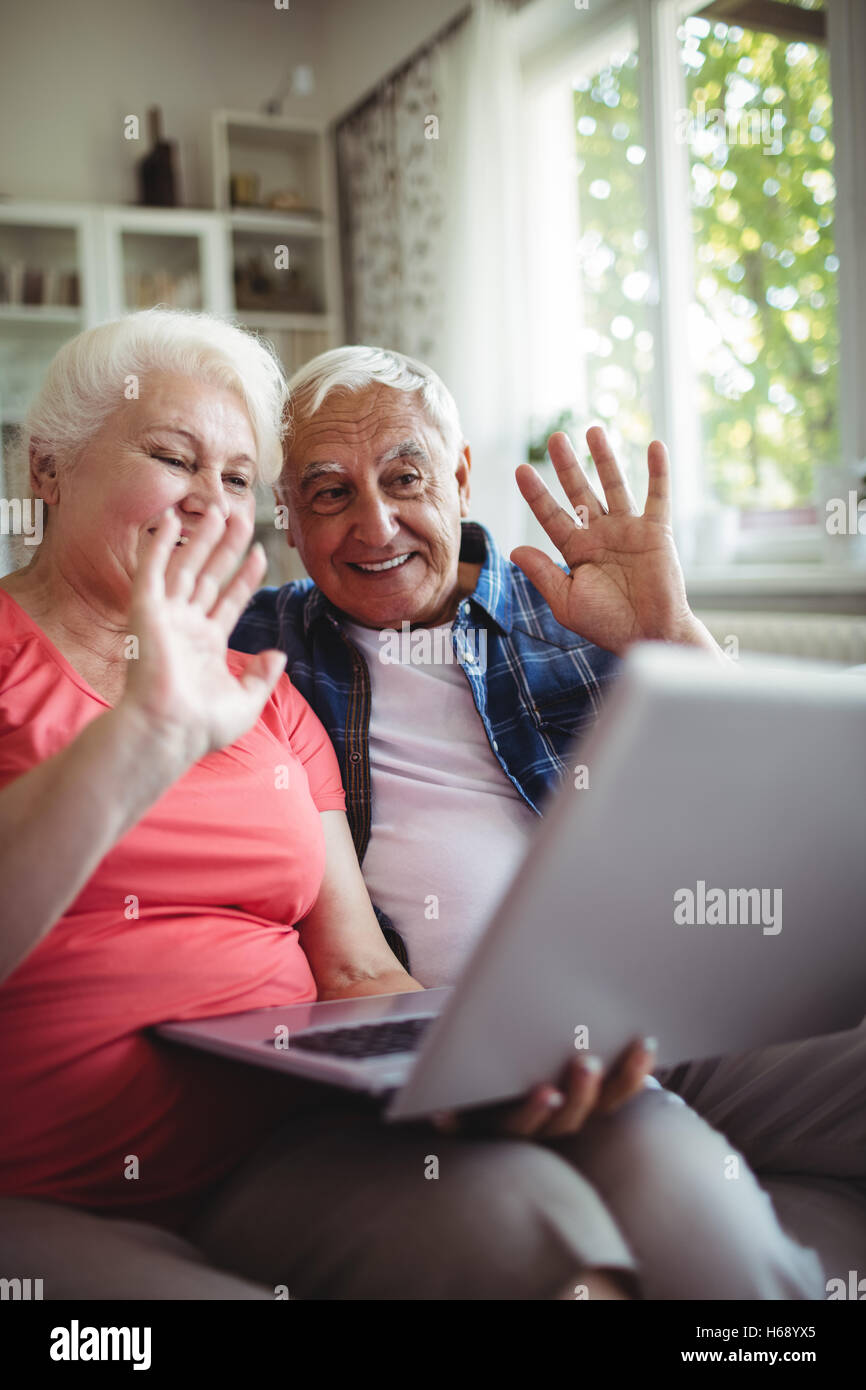 Senior woman talking video chat hi-res stock photography and images - Alamy
