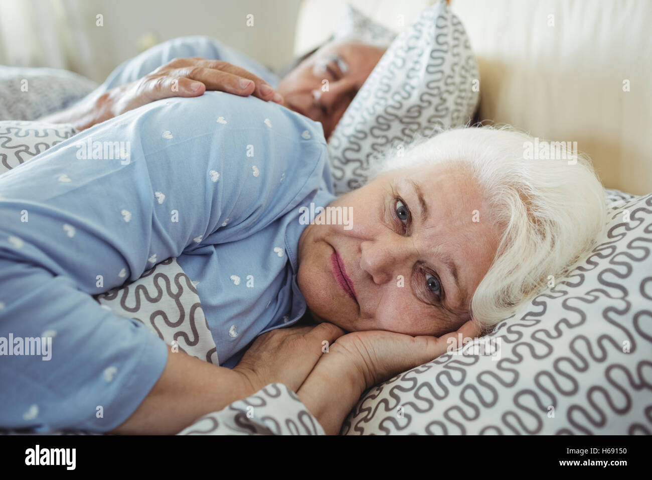 Elderly woman bed awake hi-res stock photography and images - Alamy