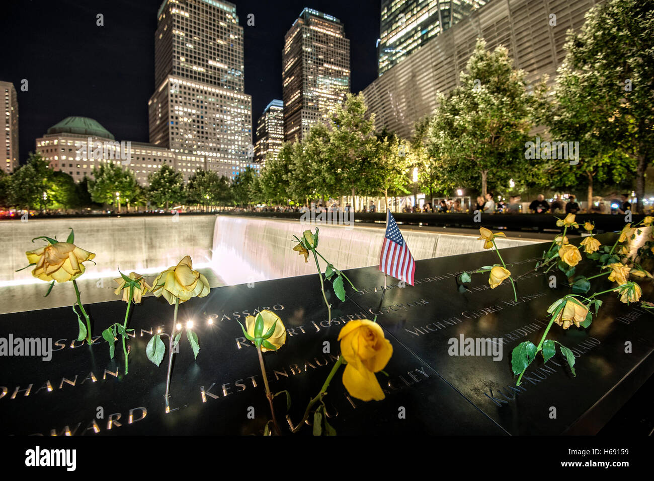 Yellow roses and American flag at North Pool, Ground Zero in ...