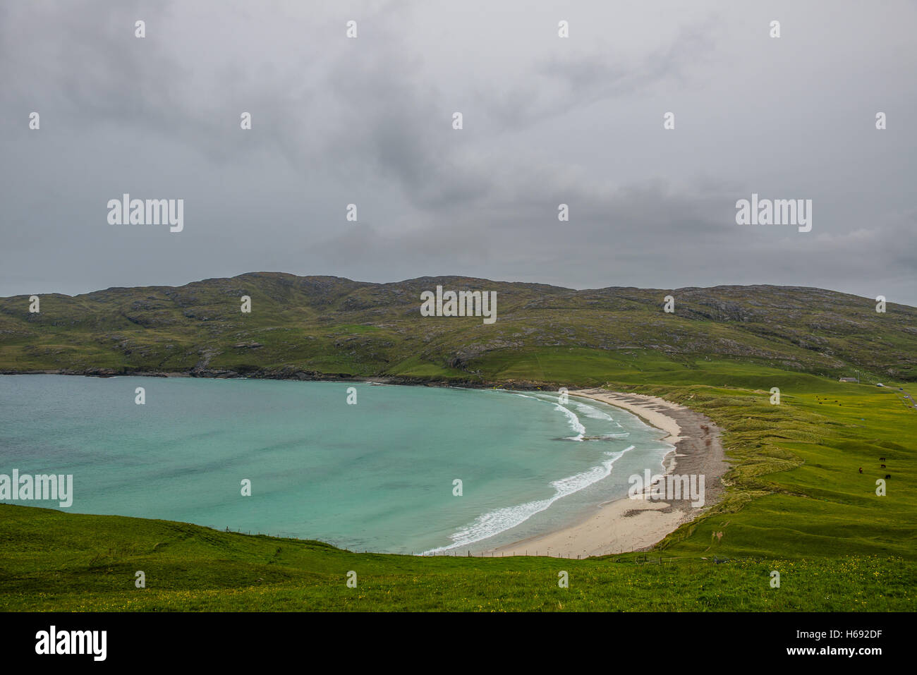 A beach on the island of Vatersay in the Outer Hebradies, Scotland ...