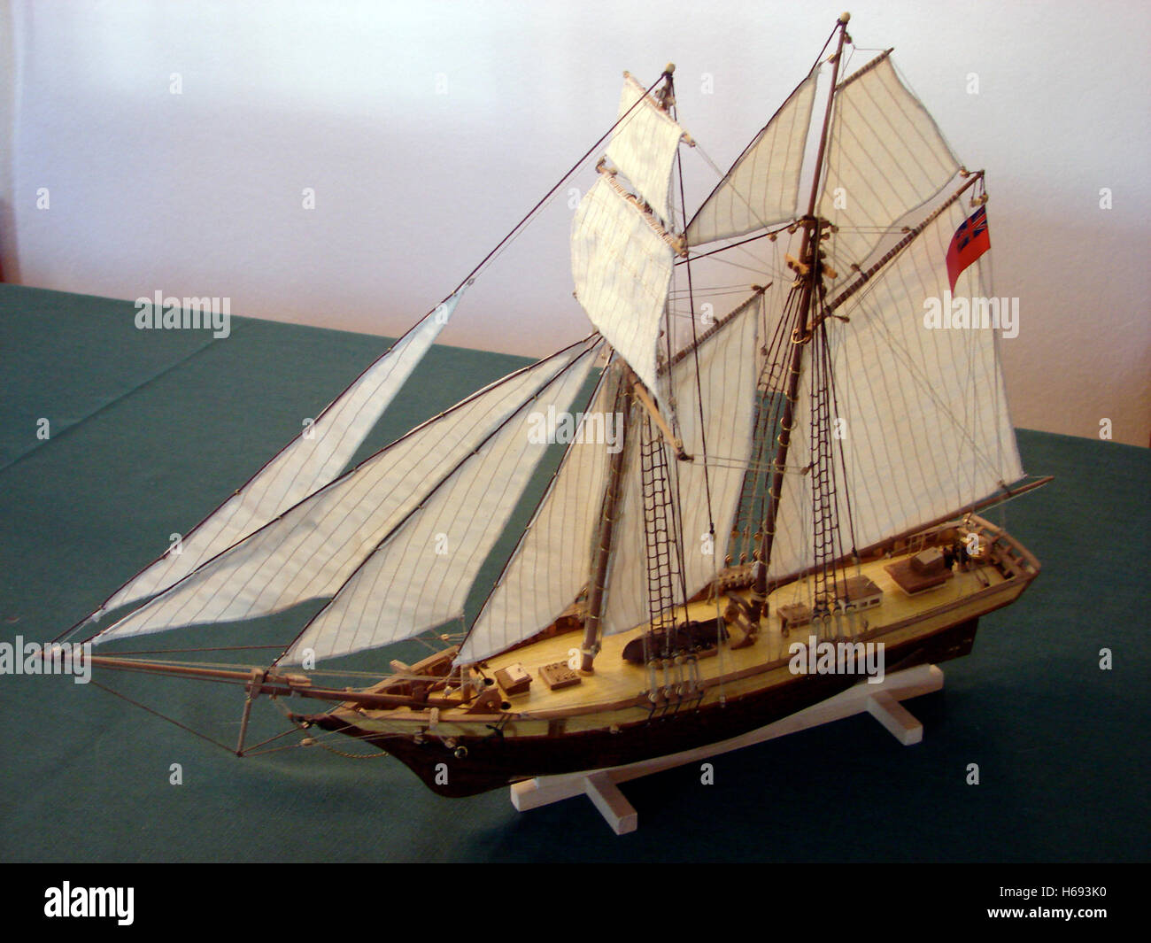 Wooden model ship fully rigged complete with sails Stock Photo - Alamy