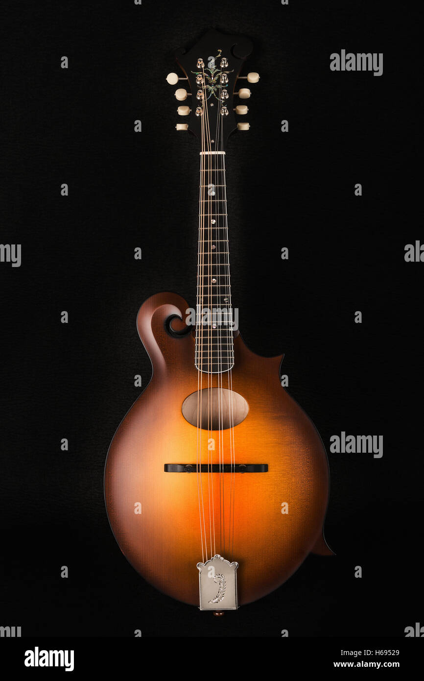 Mandolin on black backgroun, front view Stock Photo - Alamy