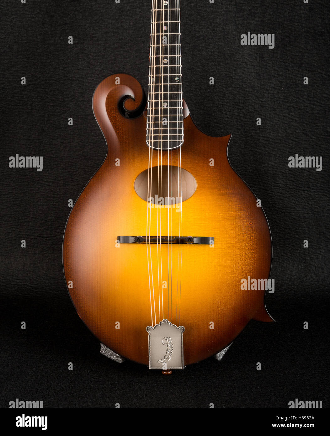 Mandolin on black background, front view, mandoline Stock Photo - Alamy