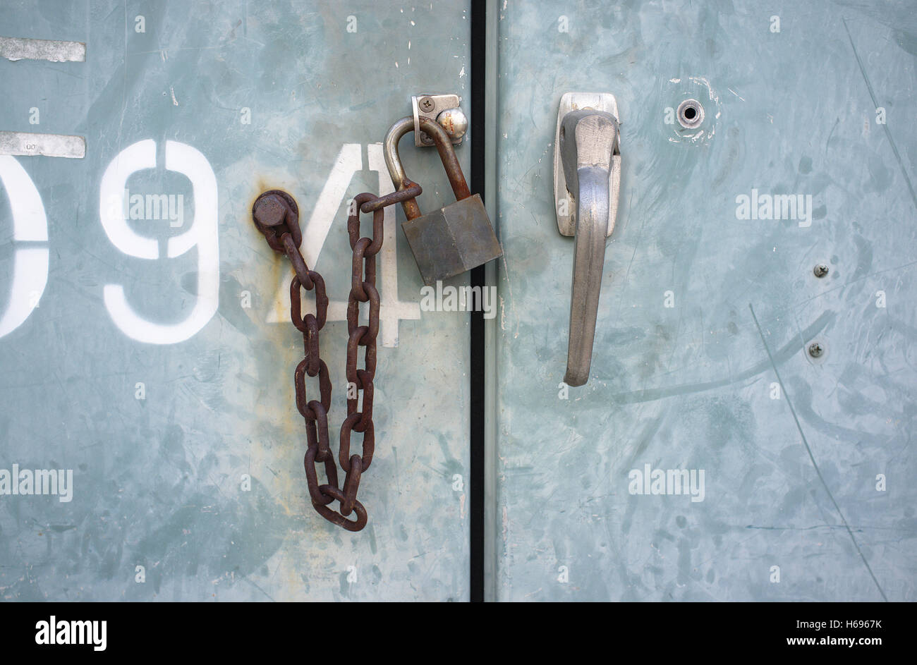 check-lock and chain on iron cabinet Stock Photo - Alamy