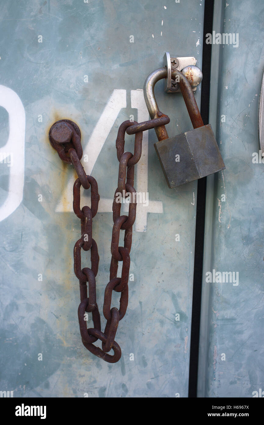 check-lock and chain on iron cabinet Stock Photo - Alamy