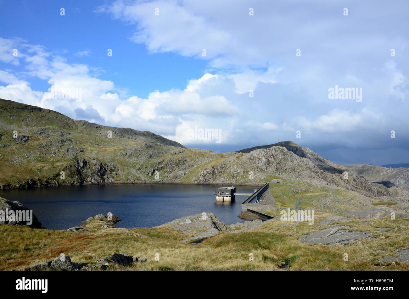 Stwlan Dam reservoir above Tanygrisiau Moelwyn mountain range Snowdonia ...