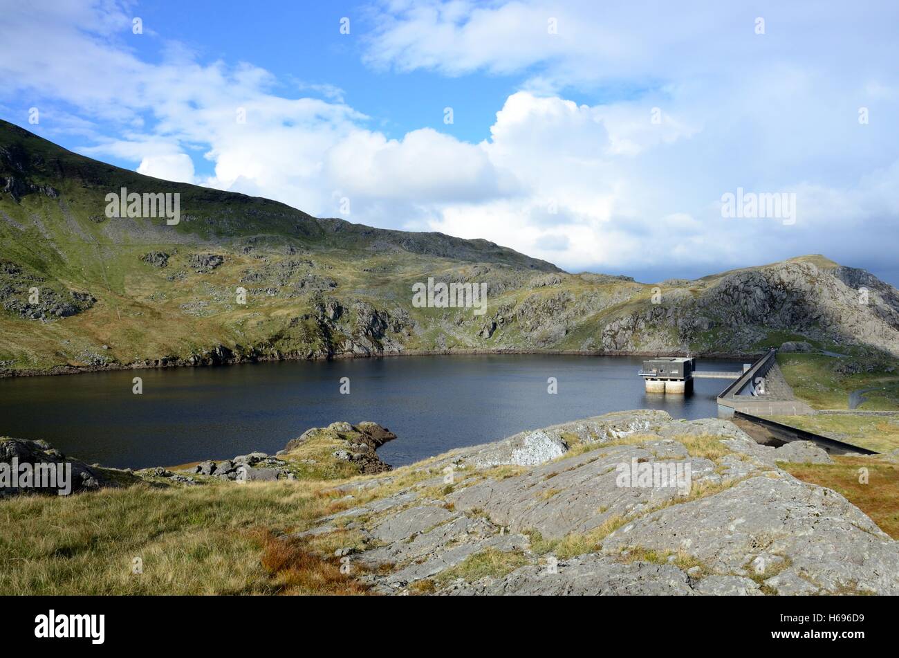 Stwlan Dam reservoir above Tanygrisiau Moelwyn mountain range Snowdonia ...