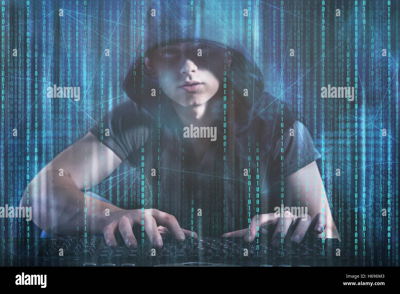 Young hacker in digital security concept Stock Photo - Alamy