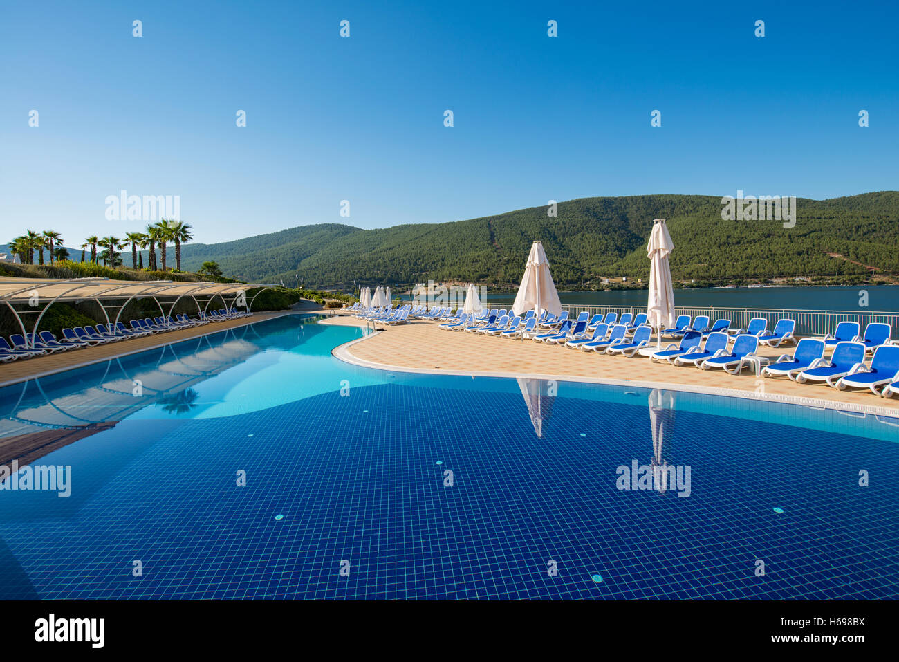 Nice swimming pool outdoors on bright summer day Stock Photo - Alamy