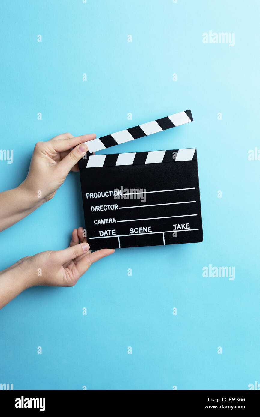 movie clapper on blue background, cinema concept Stock Photo - Alamy