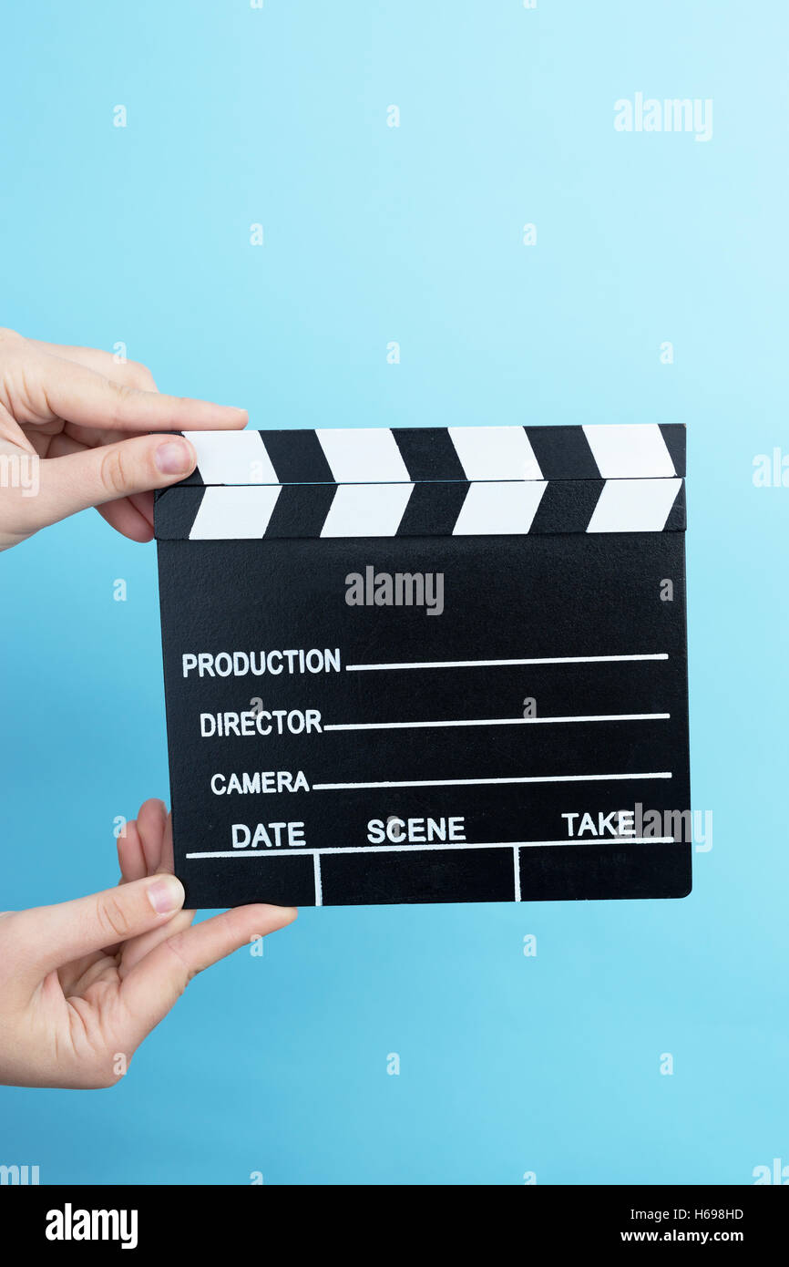 movie clapper on blue background, cinema concept Stock Photo - Alamy