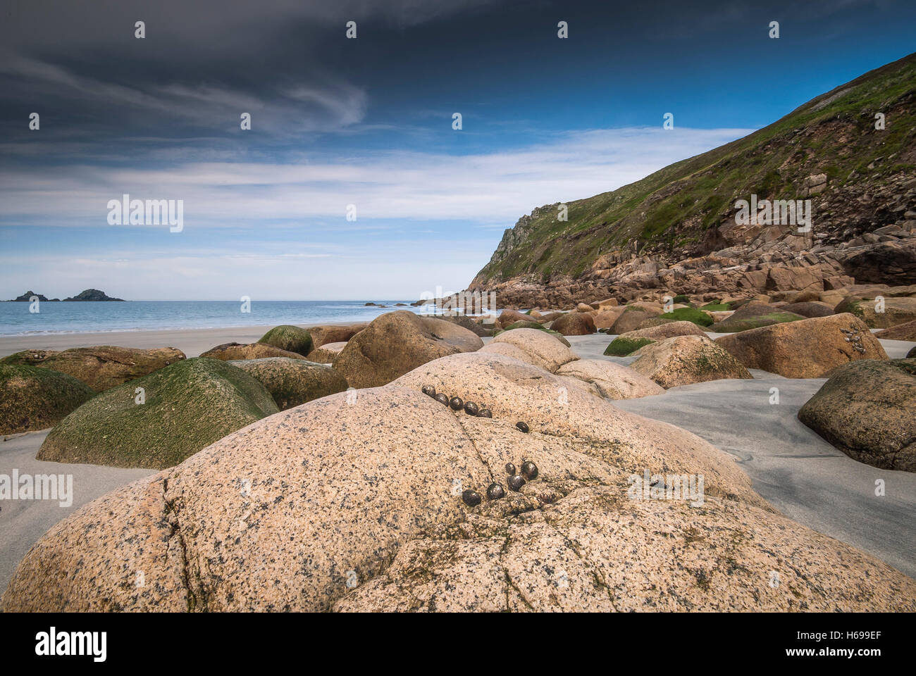 Rocks at Porth Nanven in Cornwall Stock Photo - Alamy