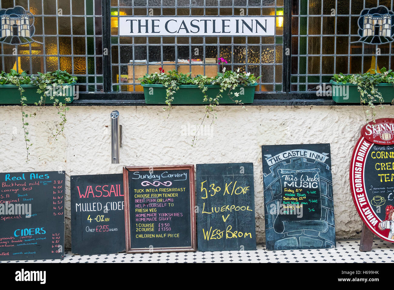 Signs outside the Castle Inn pub in St Ives, Cornwall Stock Photo - Alamy