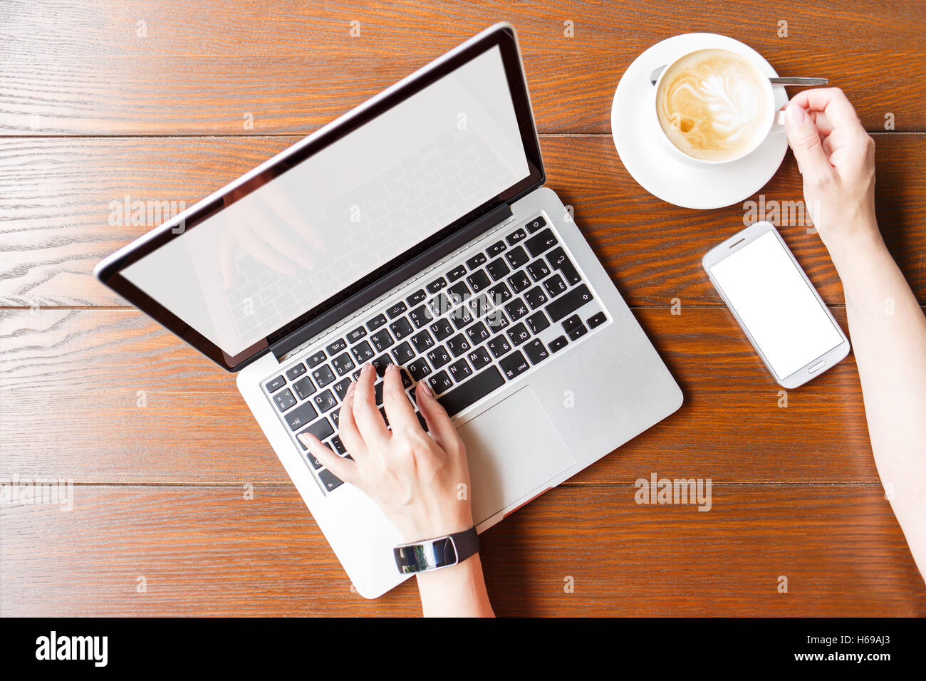 Mock up image of coffee break with laptop and smartphone overhead view ...