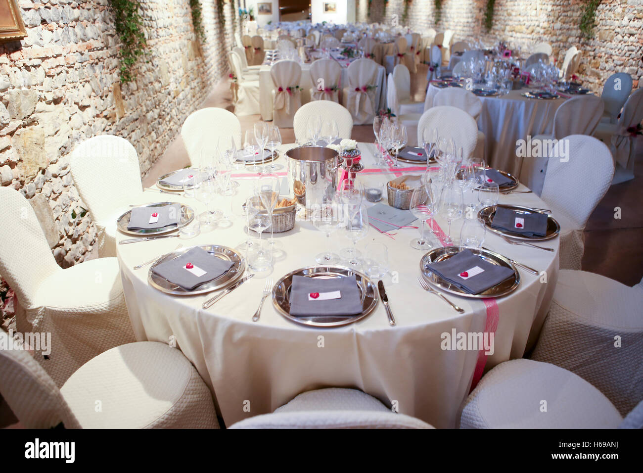 Table set for wedding or another catered event dinner Stock Photo - Alamy