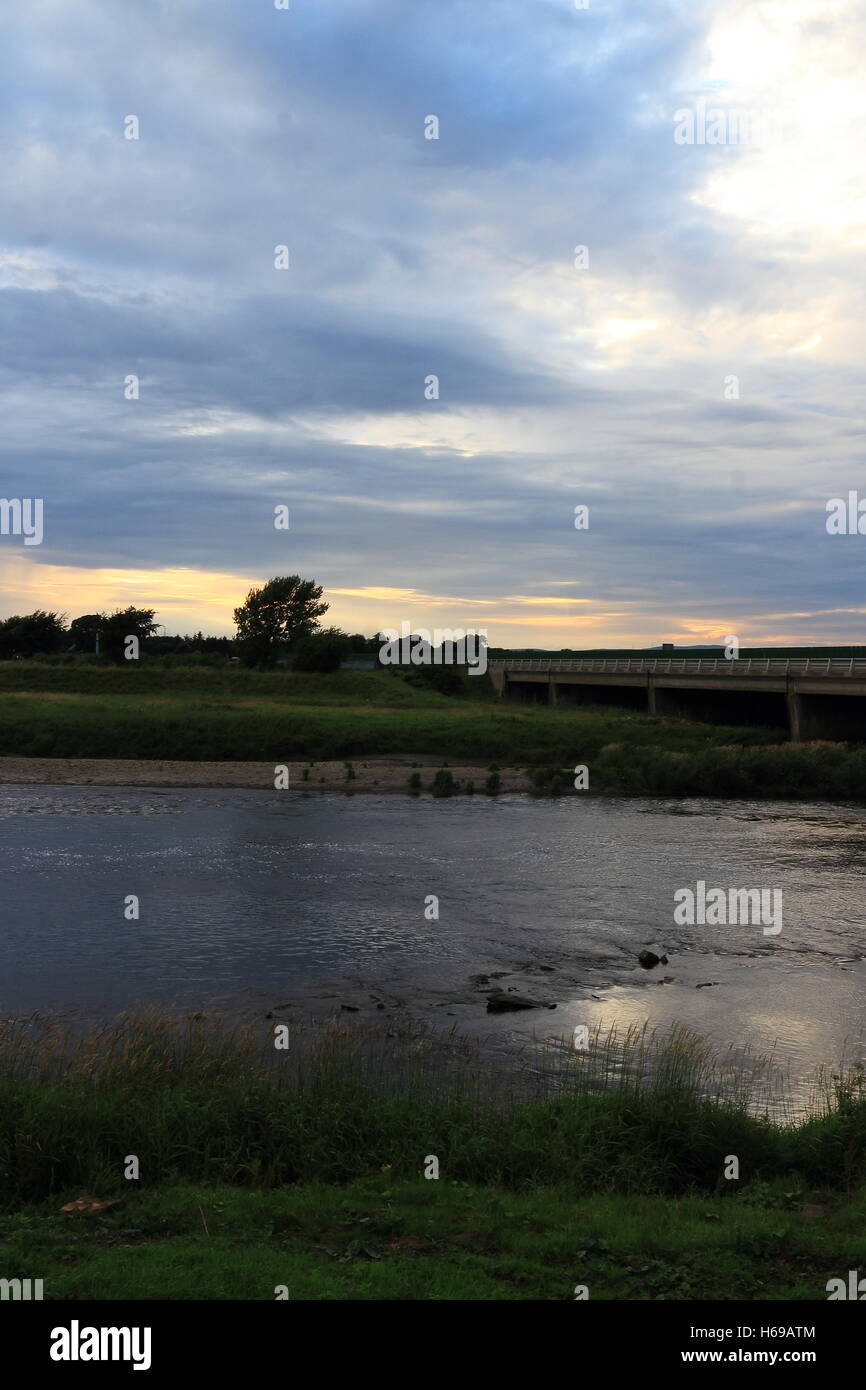 Reflections of early sunset Stock Photo - Alamy