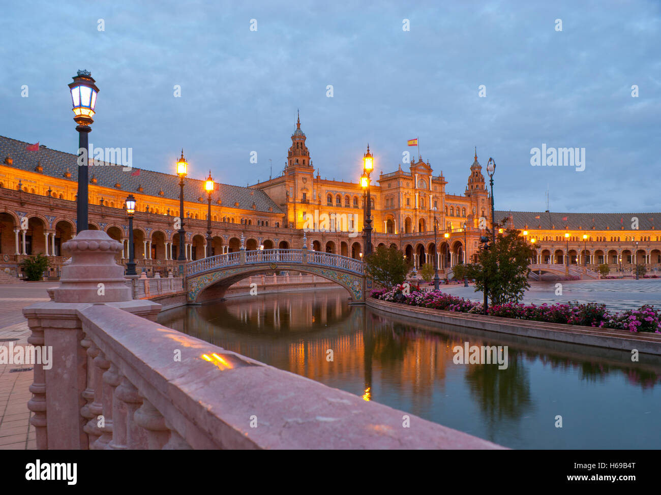 The evening decoration of the Square of Spain in Seville Stock Photo ...