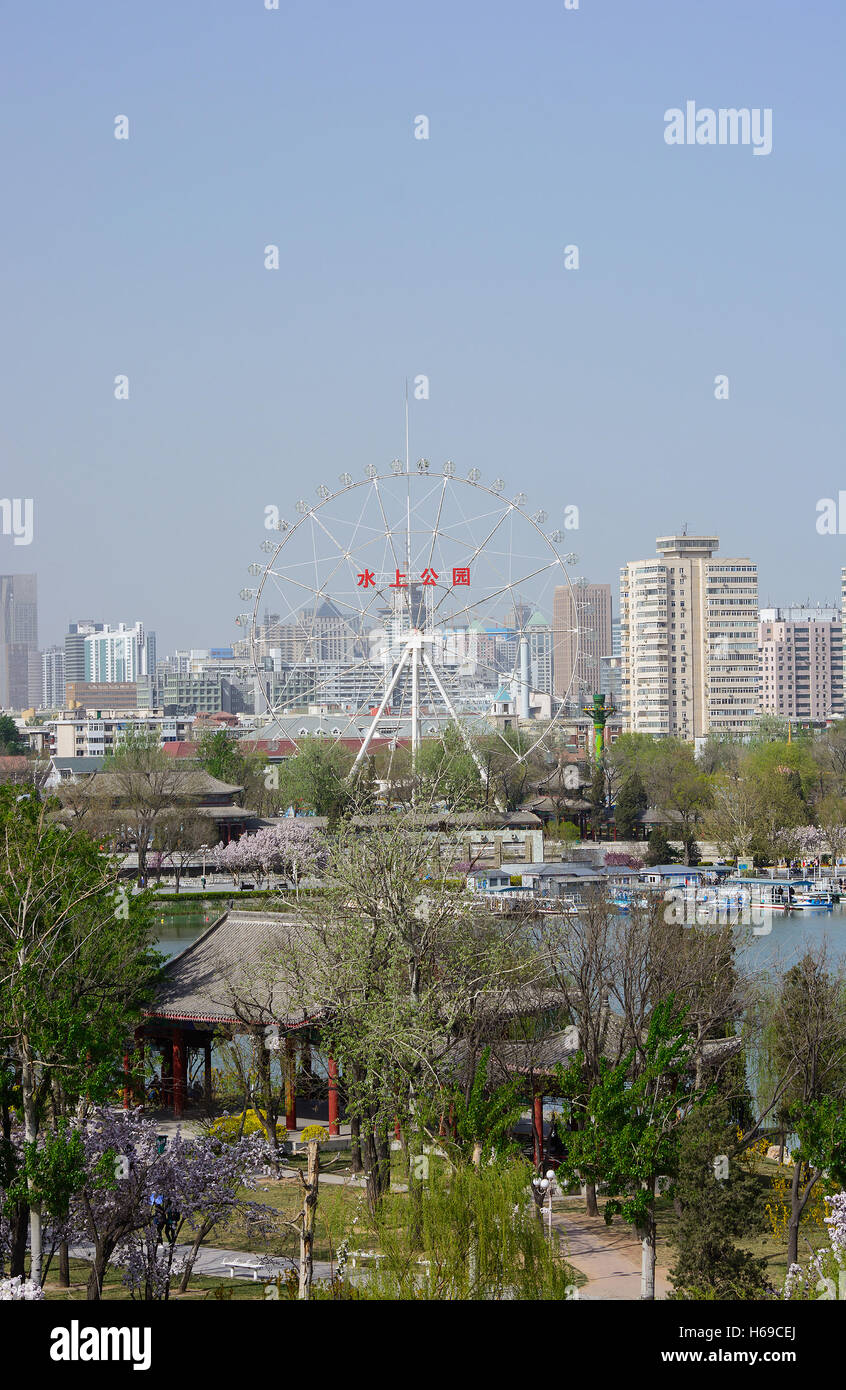 Tianjin,China - April 7,2016 : Cityscape of ferris wheel in Water park ...