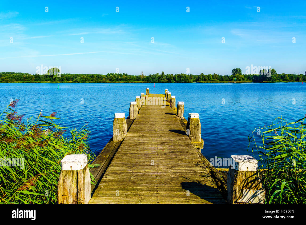 A mooring dock for boats in the bird sanctuary of Veluwemeer near the ...