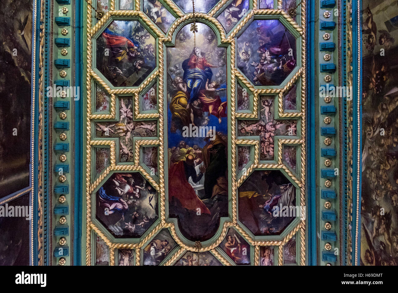 An elaborate painted wooden ceiling shows scenes from Christianity ...