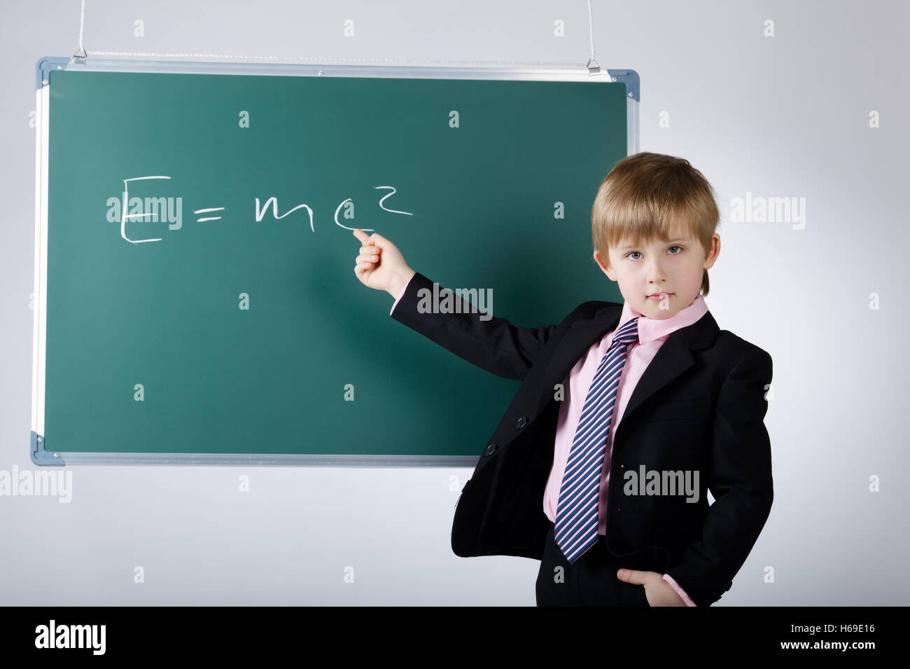 little funny boy with blackboard Stock Photo - Alamy