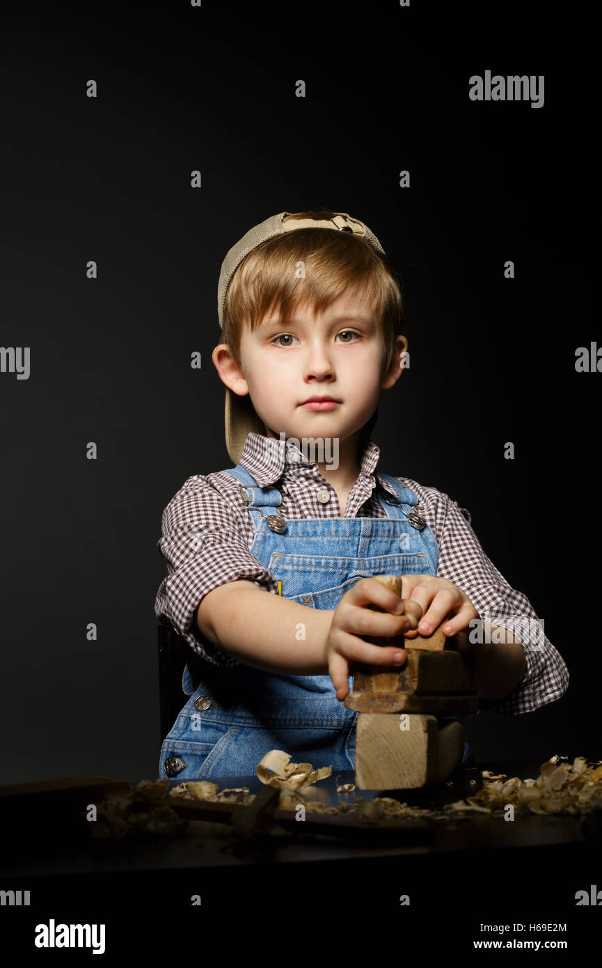 little boy working with plane Stock Photo - Alamy