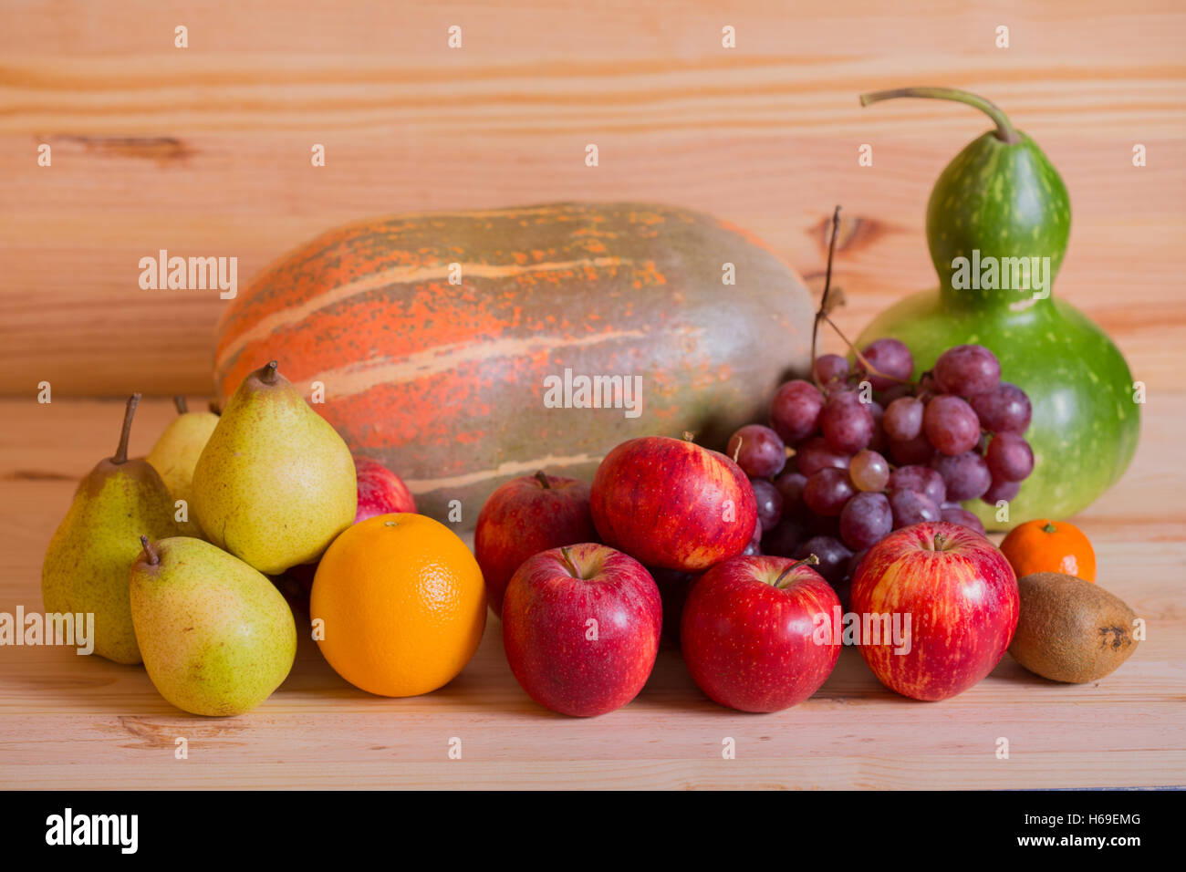 fruits on wooden table, studio picture Stock Photo - Alamy