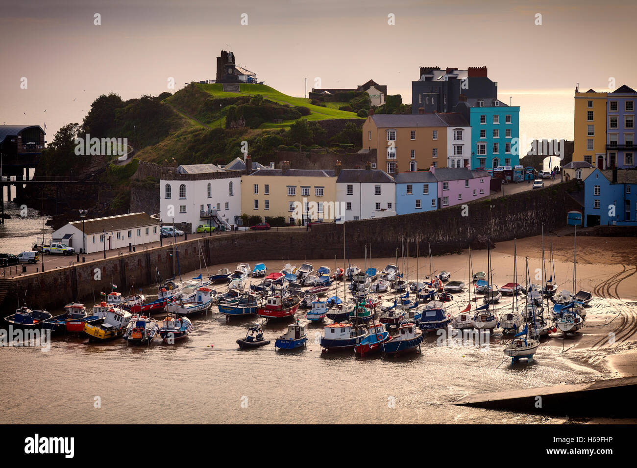 The Harbour and Castle Hill in Tenby a seaside town on the western side ...