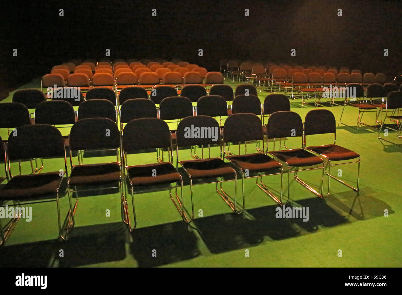 Empty chairs of an auditorium in a congress hall in row Stock Photo - Alamy