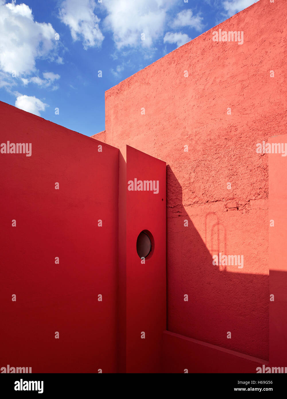Brightly coloured exterior view looking into central void. Pedro Reyes ...