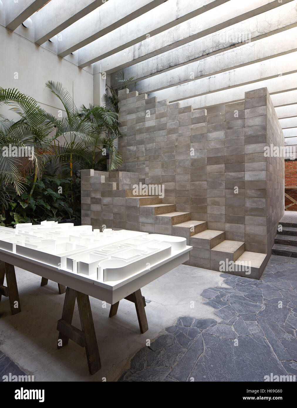 Rear view towards artists 'pyramid' studio with art work in foreground ...