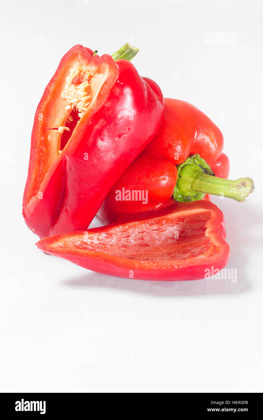 A whole pepper and pepper slices Stock Photo - Alamy