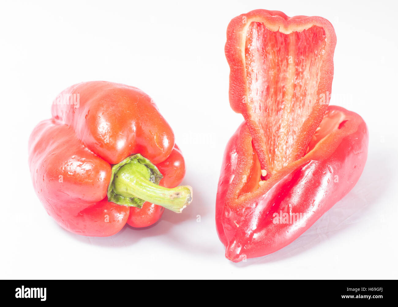 A whole pepper and pepper slices Stock Photo - Alamy
